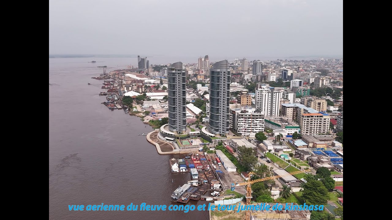 Vue aérienne du fleuve Congo et le tour jumelle de Kinshasa - YouTube