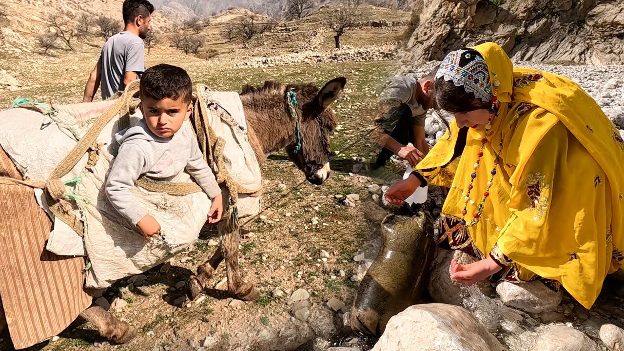 Nomadic women with their children travel a difficult path to get water ...