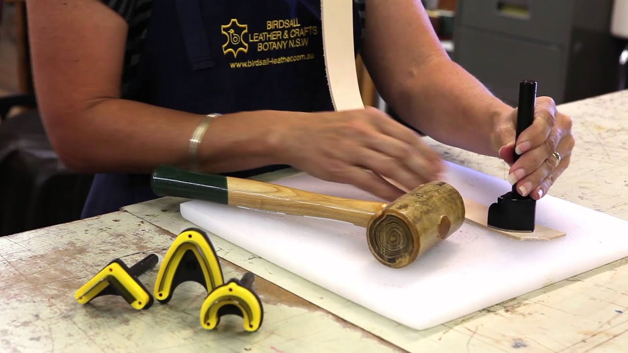 Using a Strap End Punch on a Leather Belt - YouTube