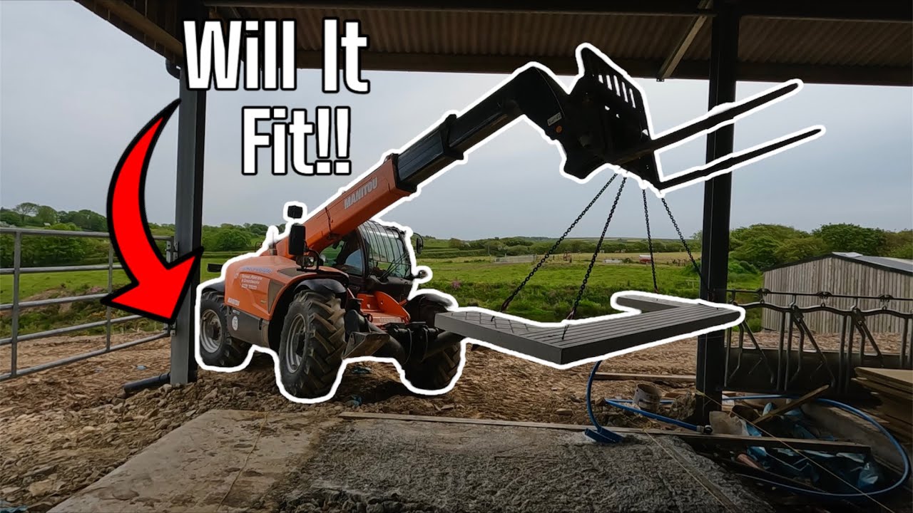 BRAND NEW SILO. RAKING IN THICK CROP OF GRASS AND PUTTING UP WALLS FOR ...