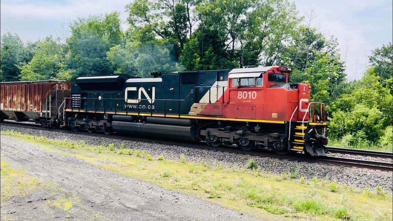 A great day trackside! CP heritage unit DPU meets NS train, CN EMD SD70 ...