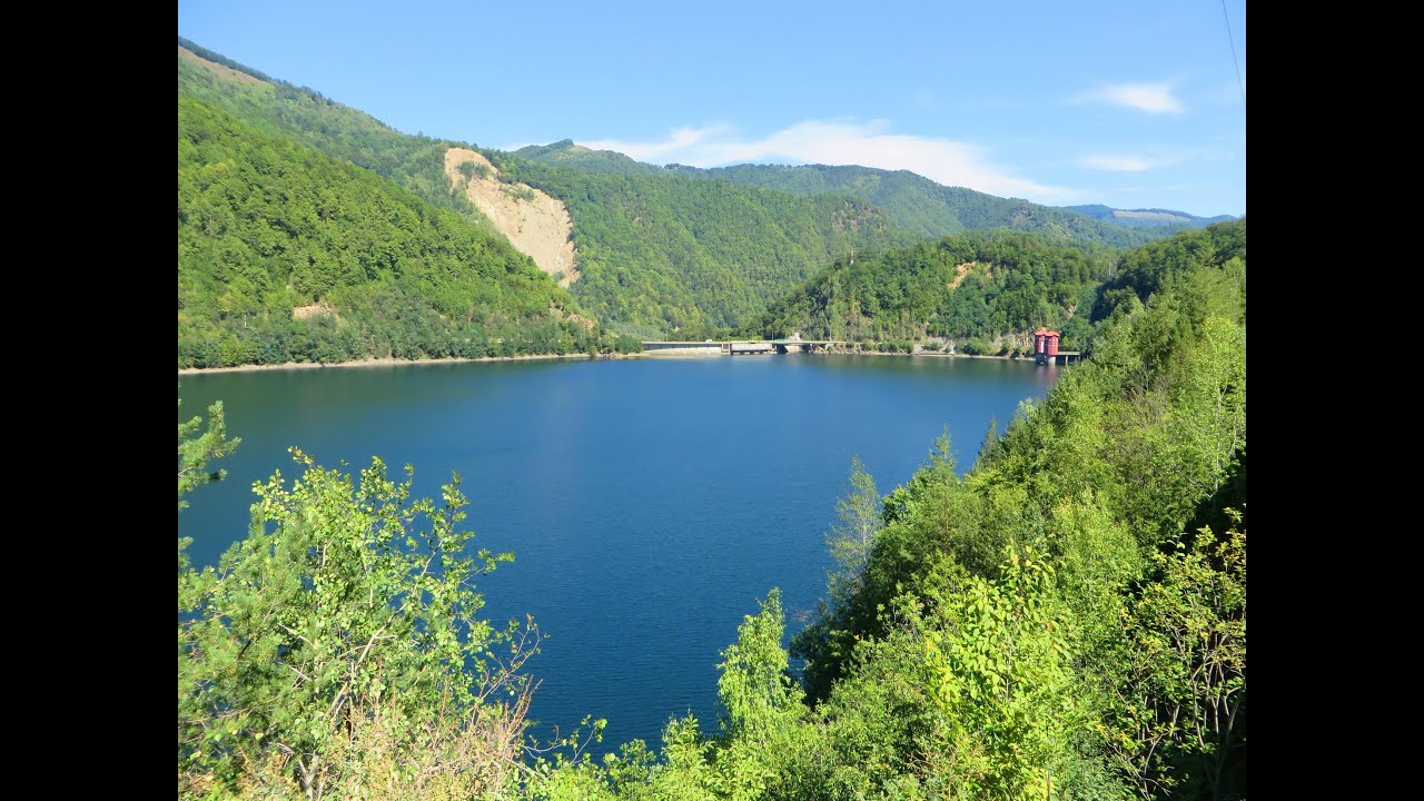 Driving on the route Voineasa - The Bradisor (Little Fir) Dam, Romania ...