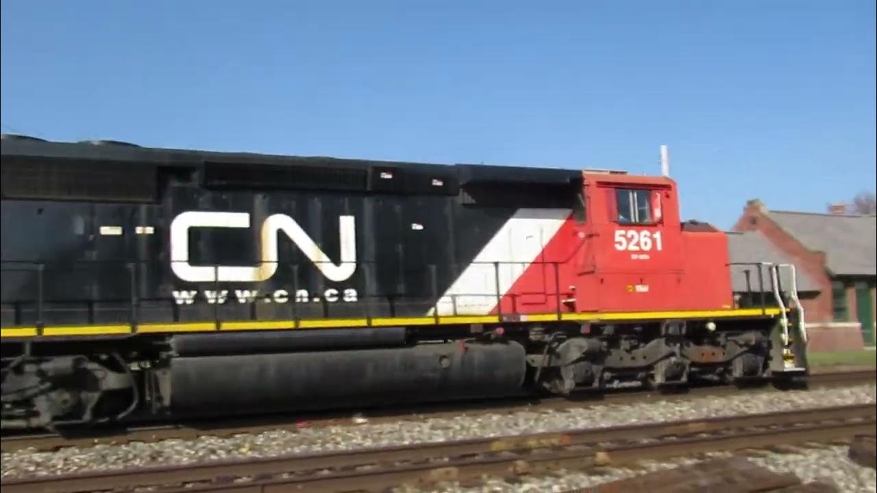 CN 5261, 5323 run an Eastbound local freight train past the depot at Vicksburg, MI - YouTube