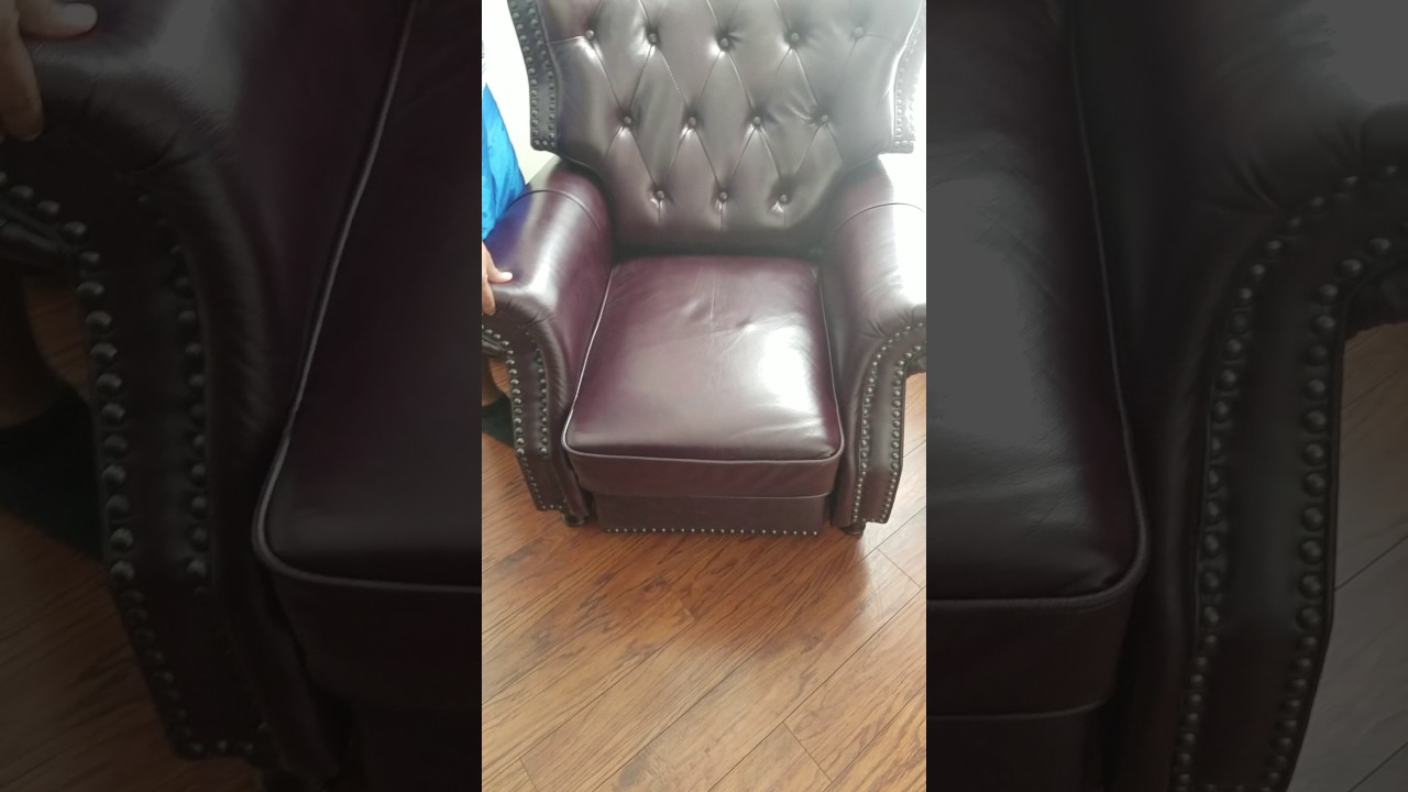 Damage to leather recliner - YouTube