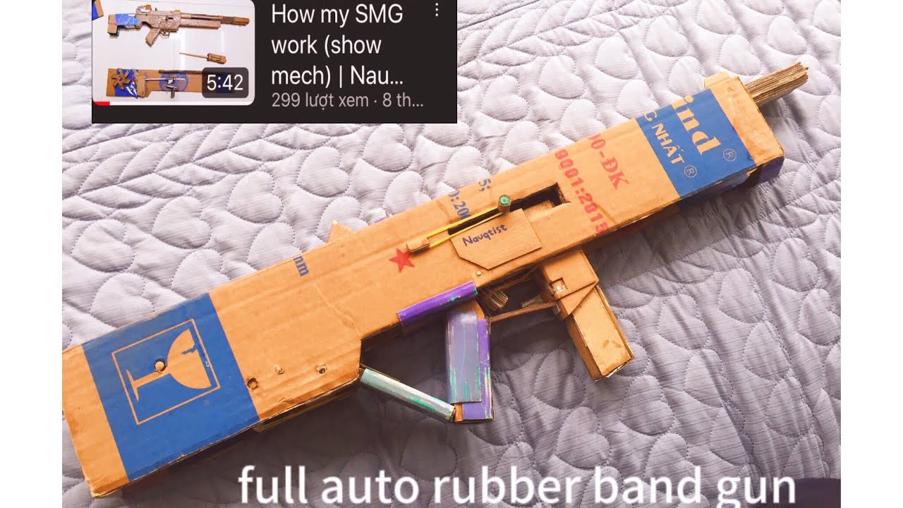 I made a full auto blowback rubber band gun from cardboard🤯 - YouTube