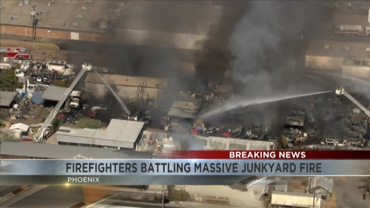Firefighters working to contain massive junkyard fire burning in ...