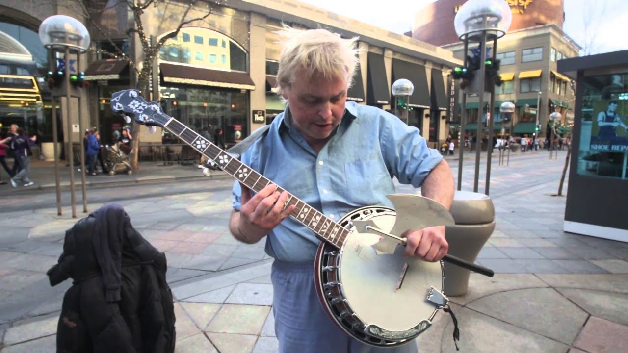 This guy plays a Banjo with an Axe. - YouTube