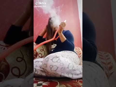Tik tok girl smoking hookahs in bed#whatsappstatusvideo - YouTube