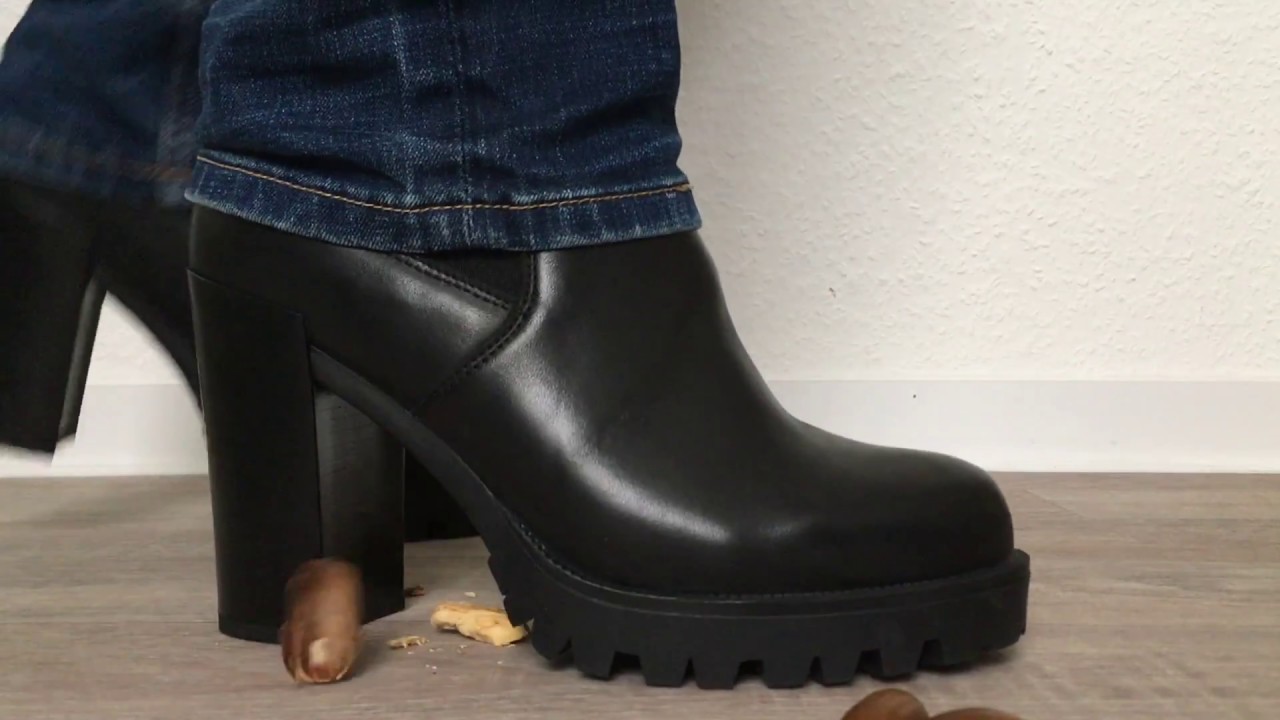 Boots with rough soles crush nuts - YouTube