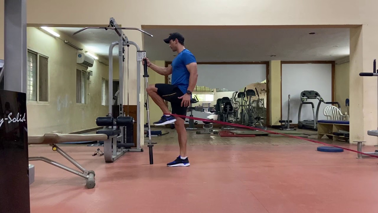 Hip flexion_standing_resistance band - YouTube