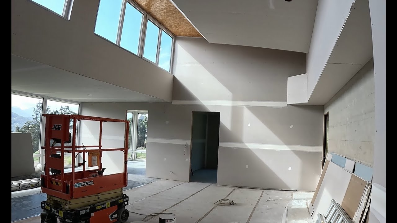 Getting plastered in our passive-solar SIP house LBU28 - YouTube