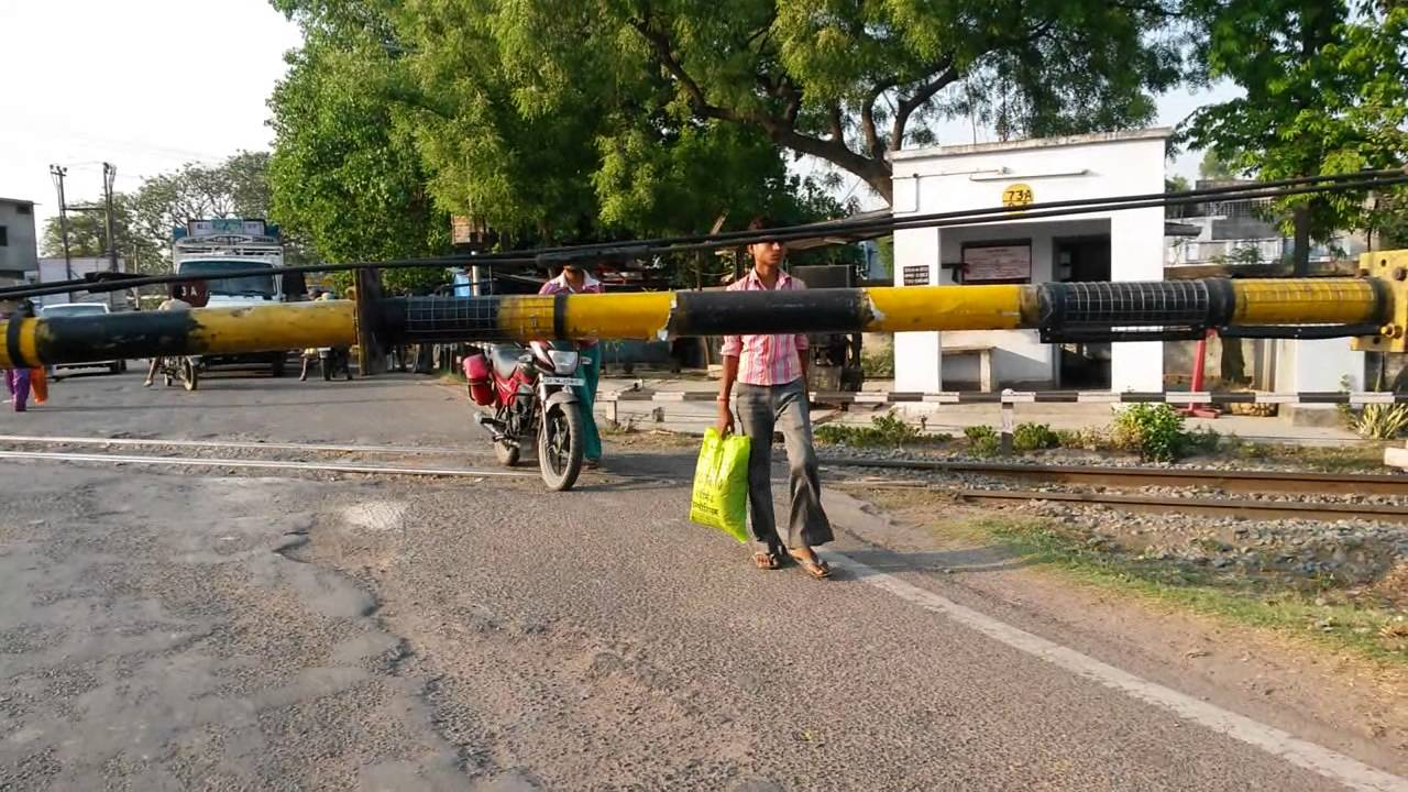 Indian rail crossing - YouTube