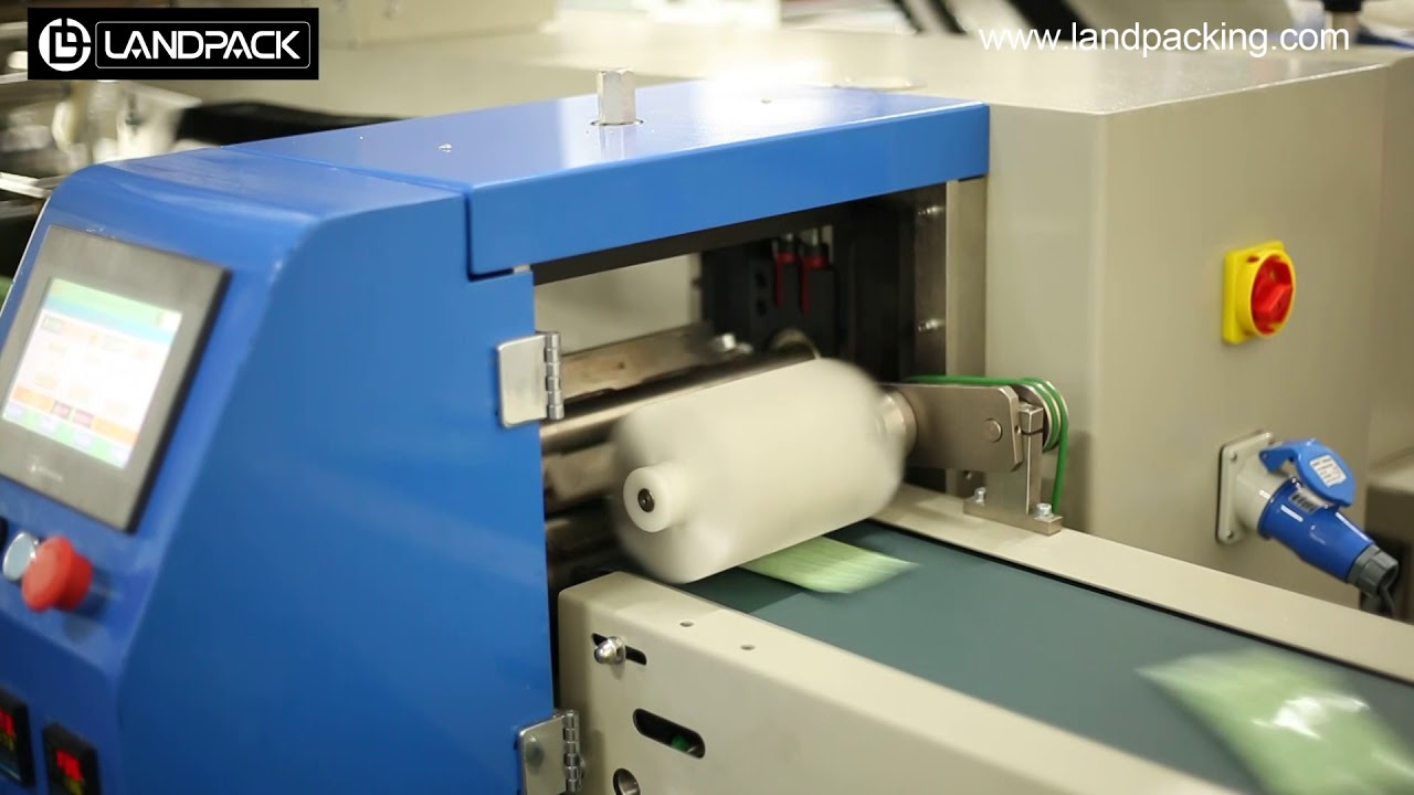 New design Automatic high speed flow wrapping machine - YouTube