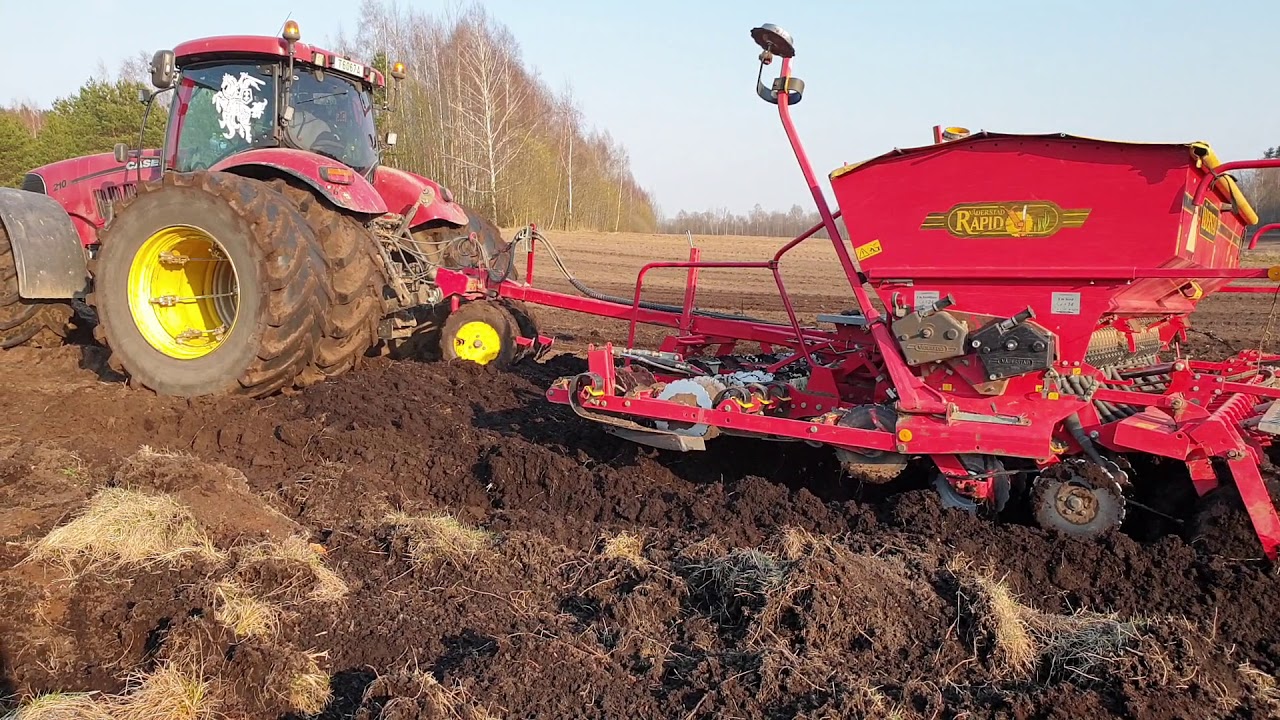 Watch a Case Tractor Pull Out a Stuck Vederstad Seeder from Muddy Field ...