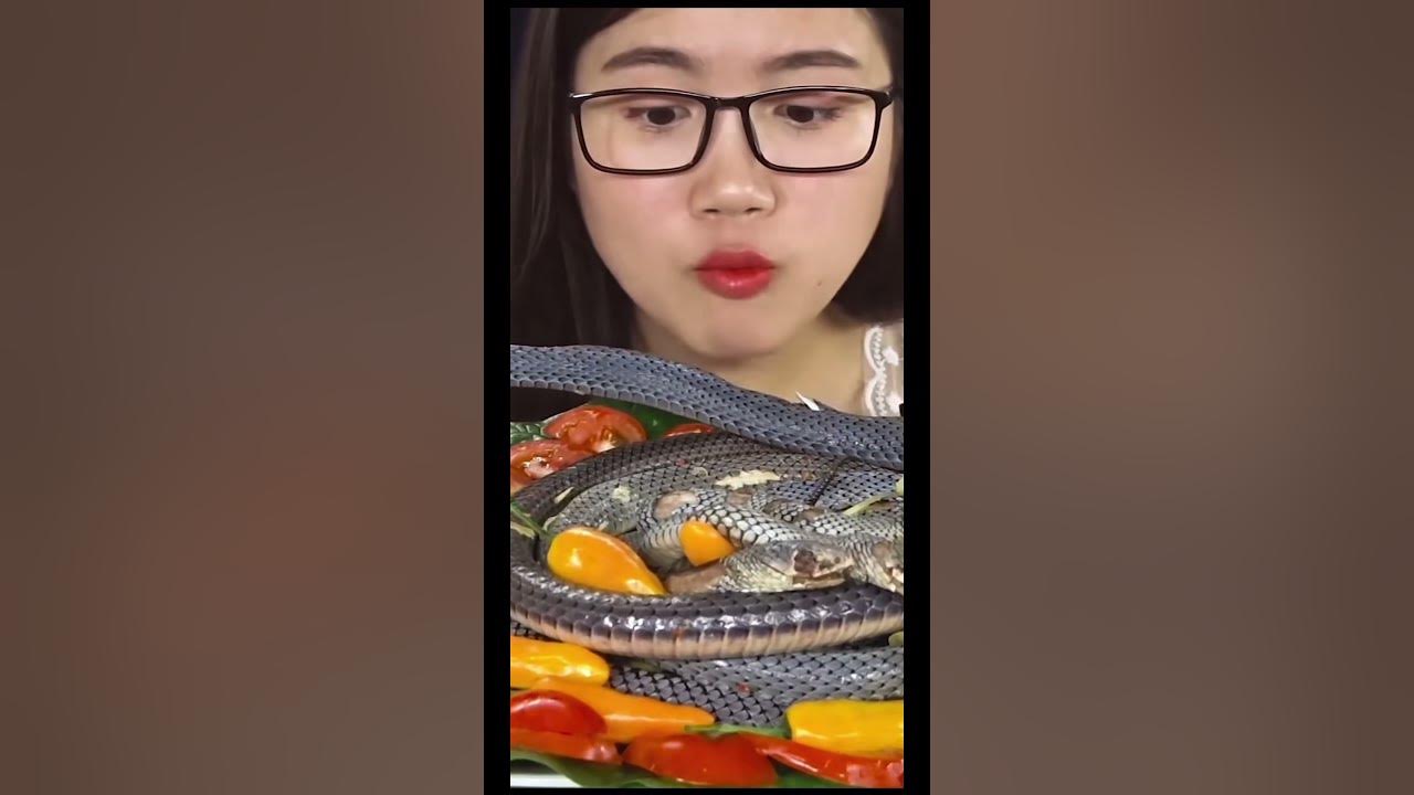 Beautiful women eats snakes - YouTube