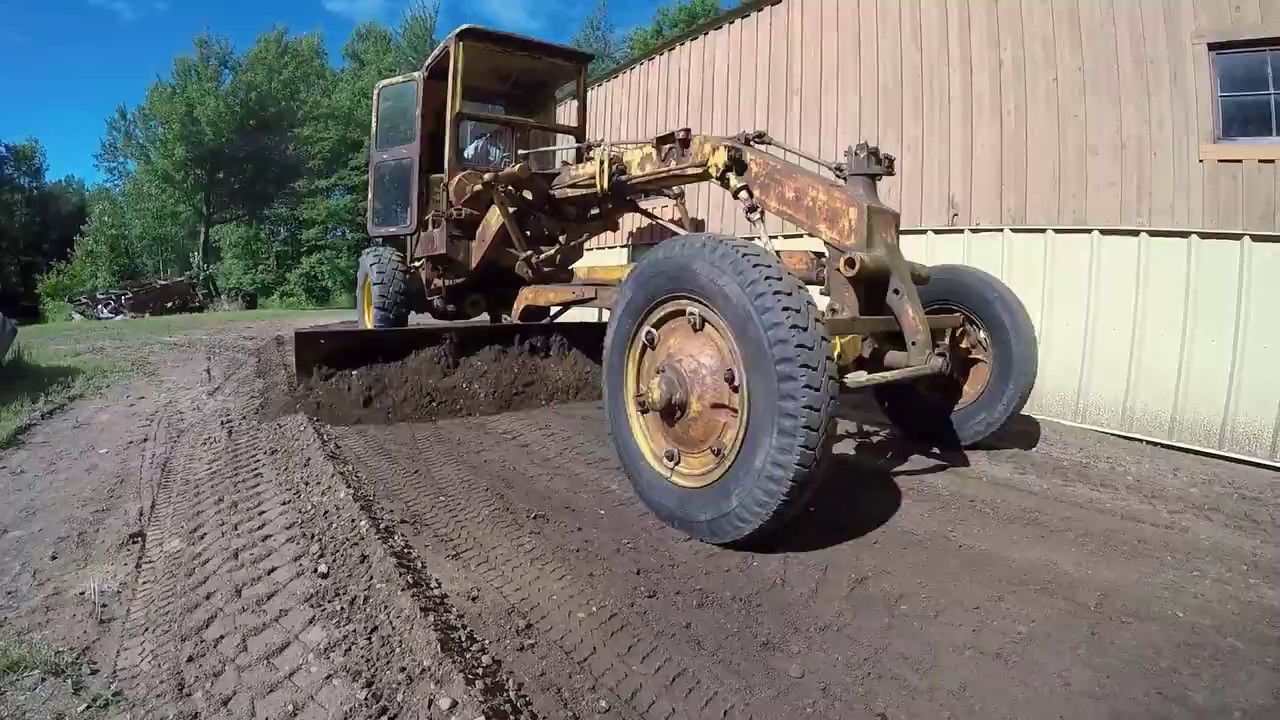 Caterpillar 212 Grader Removing Topsoil and Spreading Gravel - YouTube