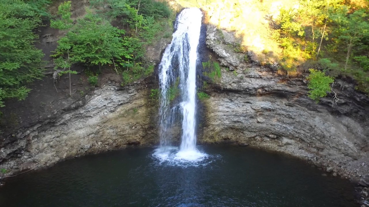 CLOSE UP AERIAL VIEW OF WATERFALL - YouTube