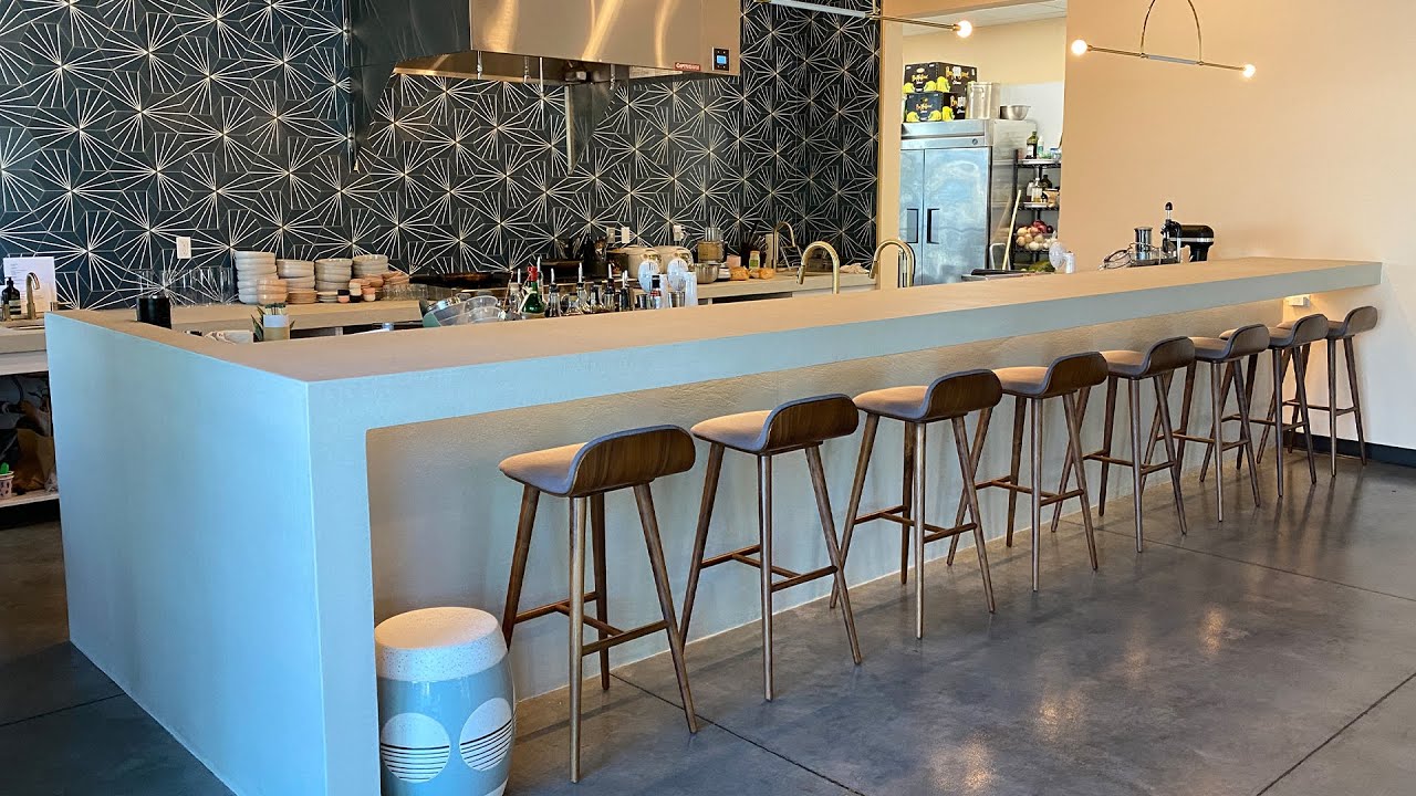 Transforming a GIANT Bar | The Ultimate Concrete Overlay Makeover - YouTube
