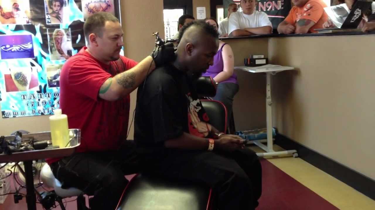 Tech N9ne getting tattooed by celebrity tattoo artist Tattoo Ortiz ...