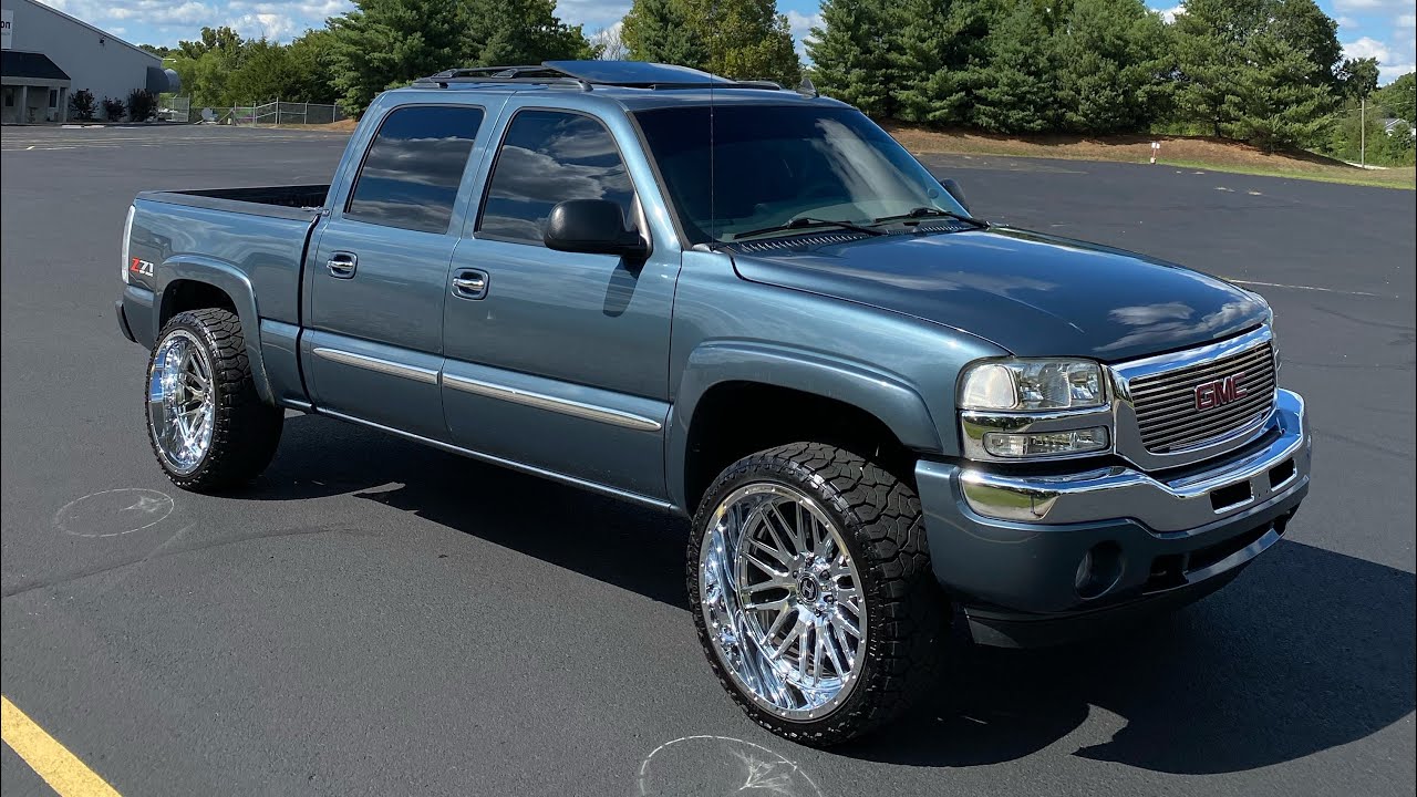 07 GMC on 24x12s and 33s - YouTube