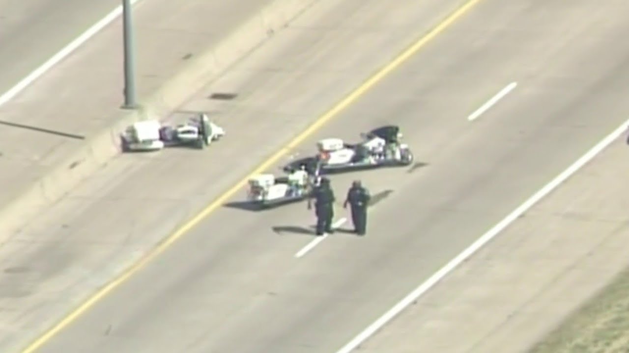 Detroit police officer on motorcycle involved in crash on EB I-96 - YouTube
