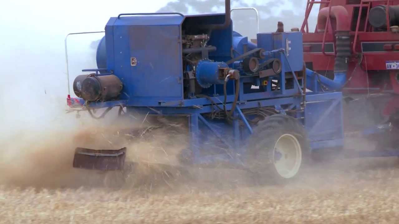 Capture weed seeds at harvest: Harrington Seed Destructor - YouTube