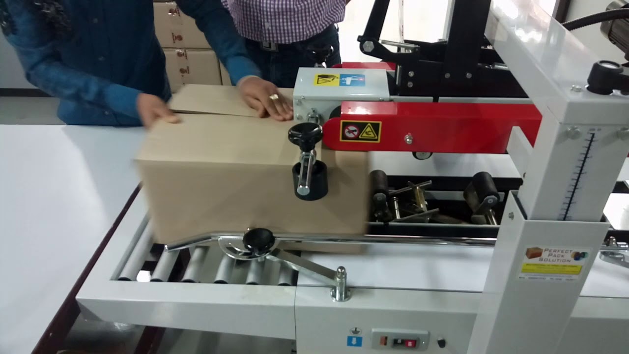 Carton Tapping Machine manufacture - YouTube