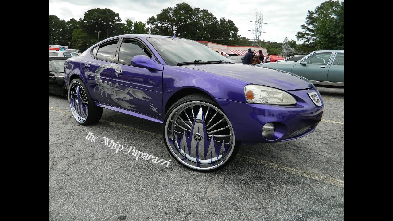Purple Pontiac Grand Prix on 30" Dub F.U Floaters Stunt World BBQ - YouTube