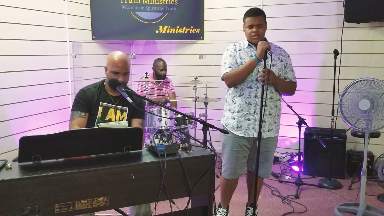 Mervin Mayo & 13 year old Football Center Elijah Allen, @ TM singing ...
