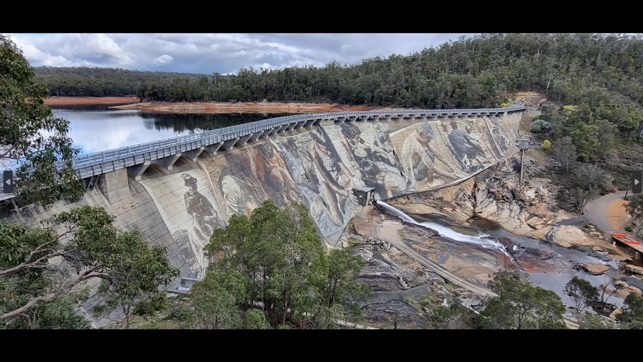 Someone painted this entire Dam Wall with some Artwork. Why? I am at ...