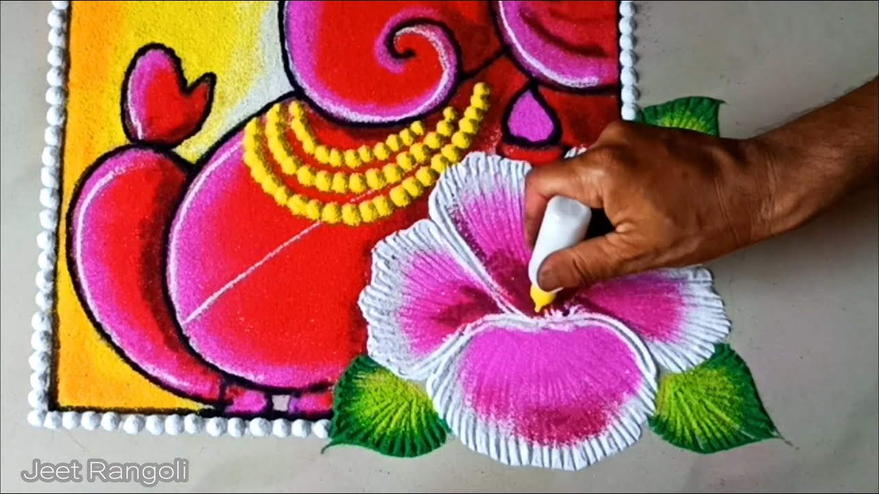 Beautiful creative and attractive Ganpati Bappa rangoli with hibiscus ...