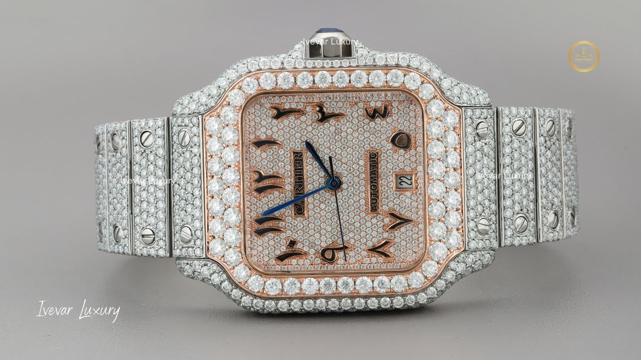 A diamond watch with Arabic numerals on a dial of silver and rose gold ...