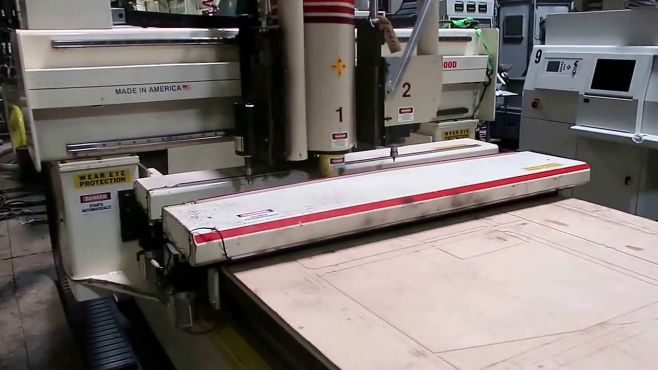 5' x 10' THERMWOOD C53 CNC ROUTER WITH ROLLER HOLD DOWN - YouTube