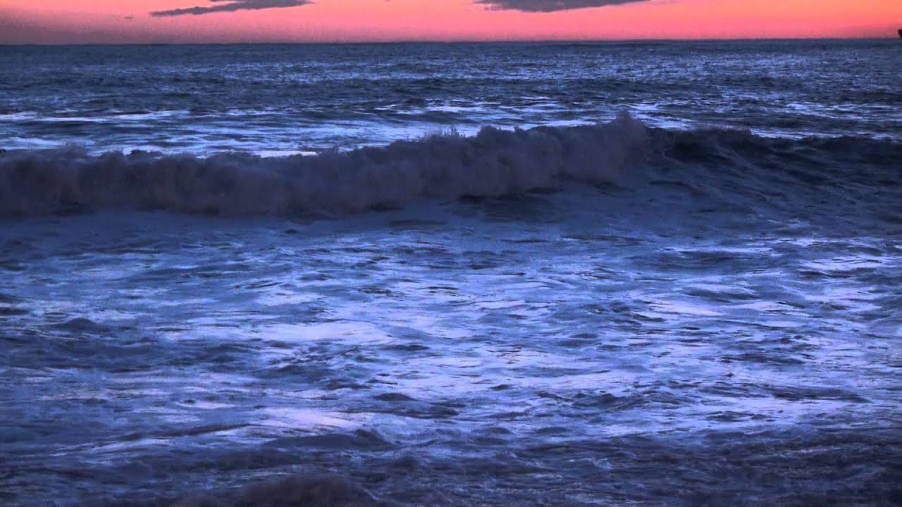 sole al tramonto con mare mosso - YouTube