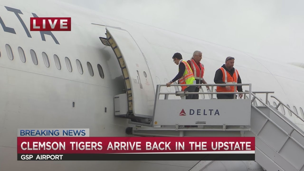 Clemson Tigers' plane lands at GSP - YouTube