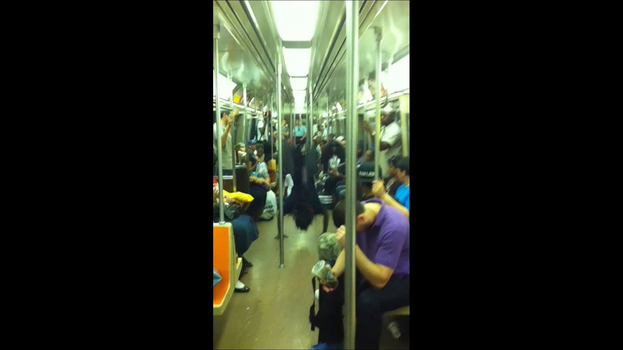 Man hits head on train ceiling while dancing - YouTube