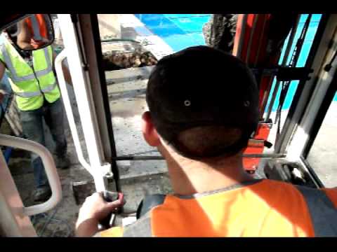 Mini excavator digging trial pit - YouTube