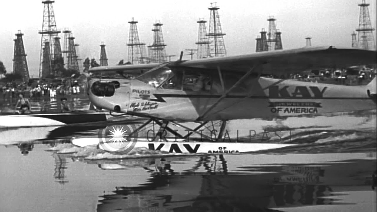 Clyde Schlieper and Wes Carroll depart and return to Marine Stadium in ...