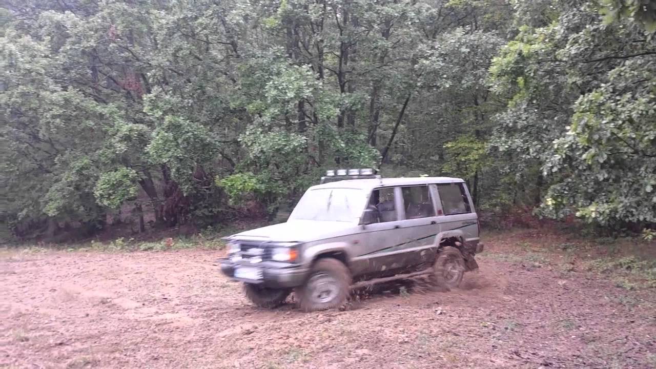 89 Isuzu Trooper in mud - YouTube