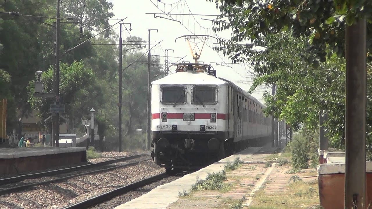 Indian Railways Chennai Rajdhani with neat looking LGD WAP7 at 130kmph ...