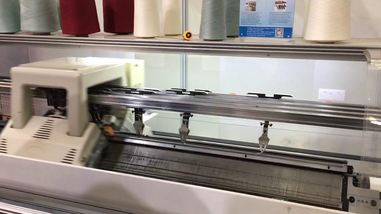 Double system flat knitting machine - YouTube