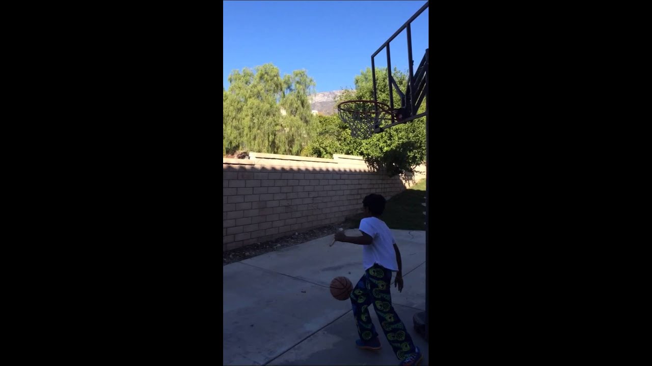 Kid dunking on 8 foot rim he's 5 feet tall - YouTube