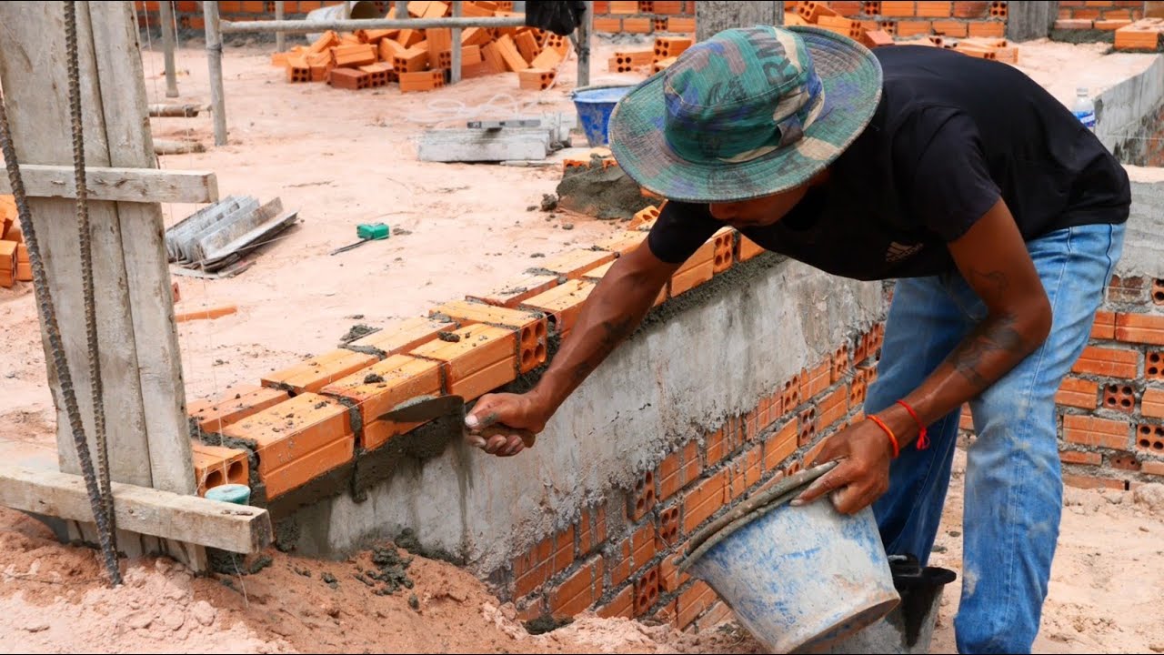 Construction work,Prepare bricks and cement along the lines,building ...
