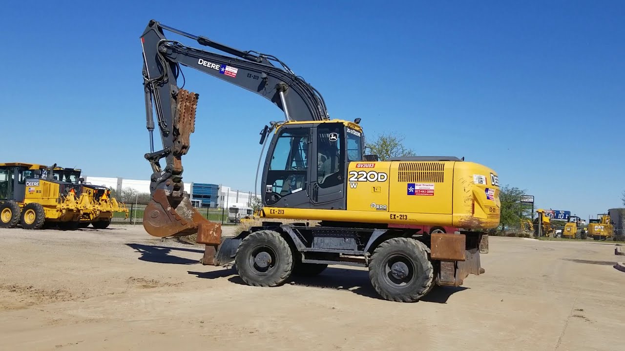 John Deere 220DW Wheel Excavator - YouTube
