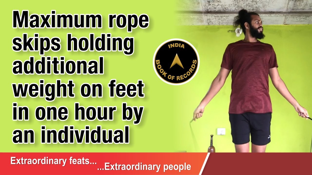 Maximum rope skips holding additional weight on feet in one hour by an ...