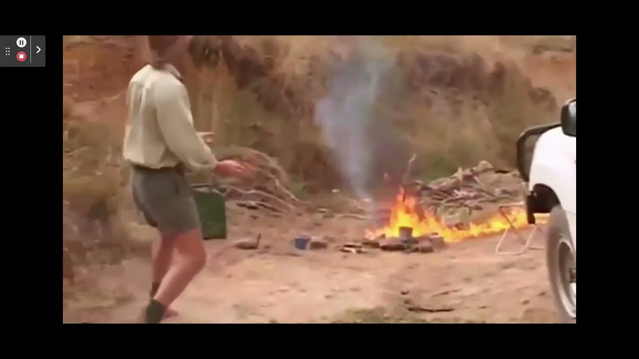 Russell Coight lights a bushfire - YouTube