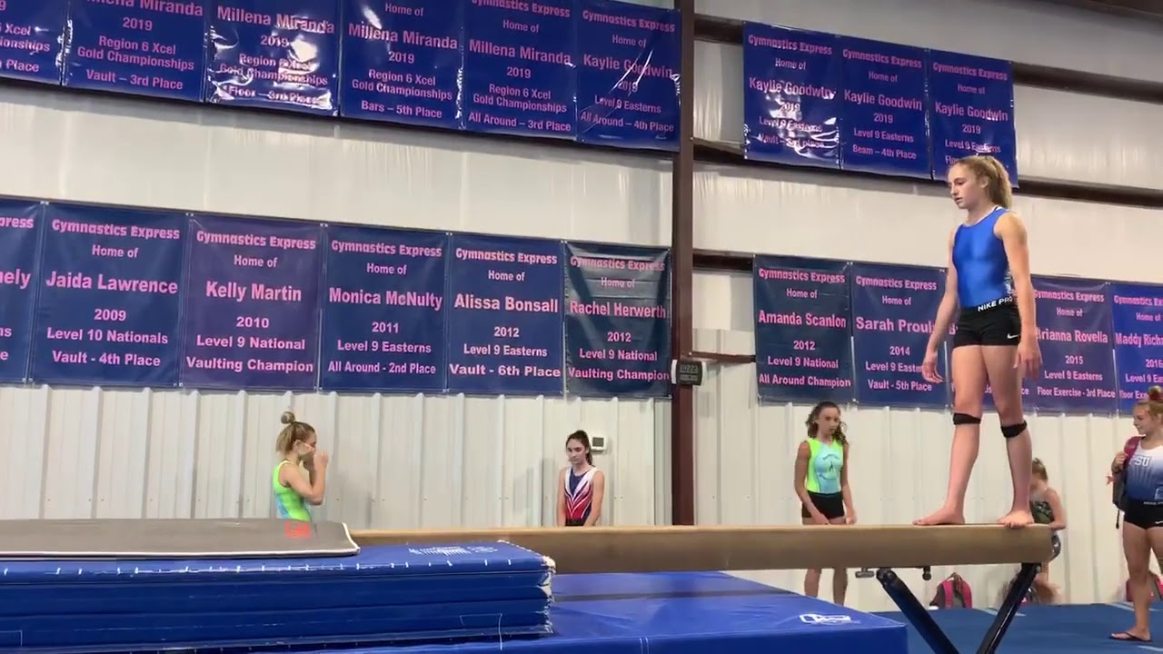Front tuck on beam - YouTube