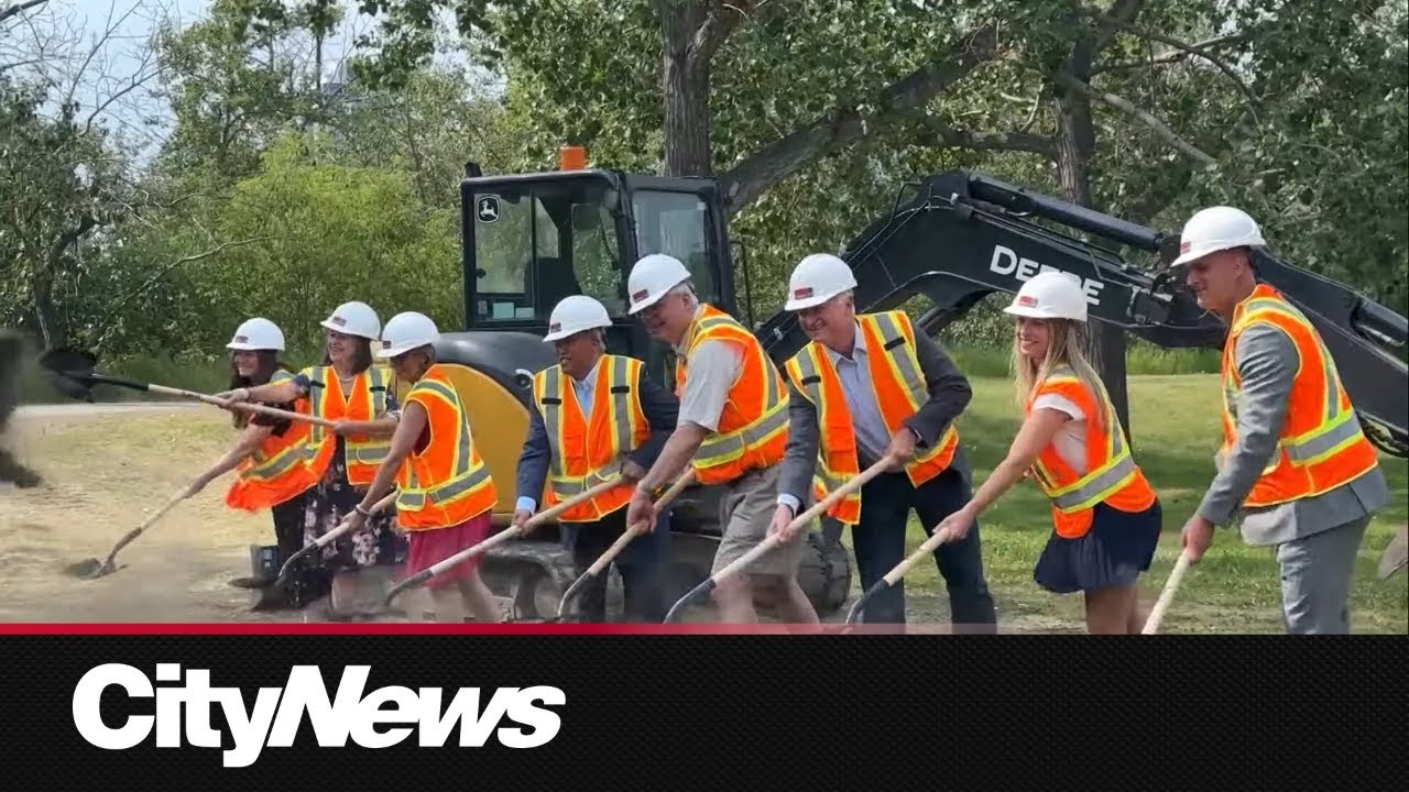 New flood barrier being built in Calgary - YouTube