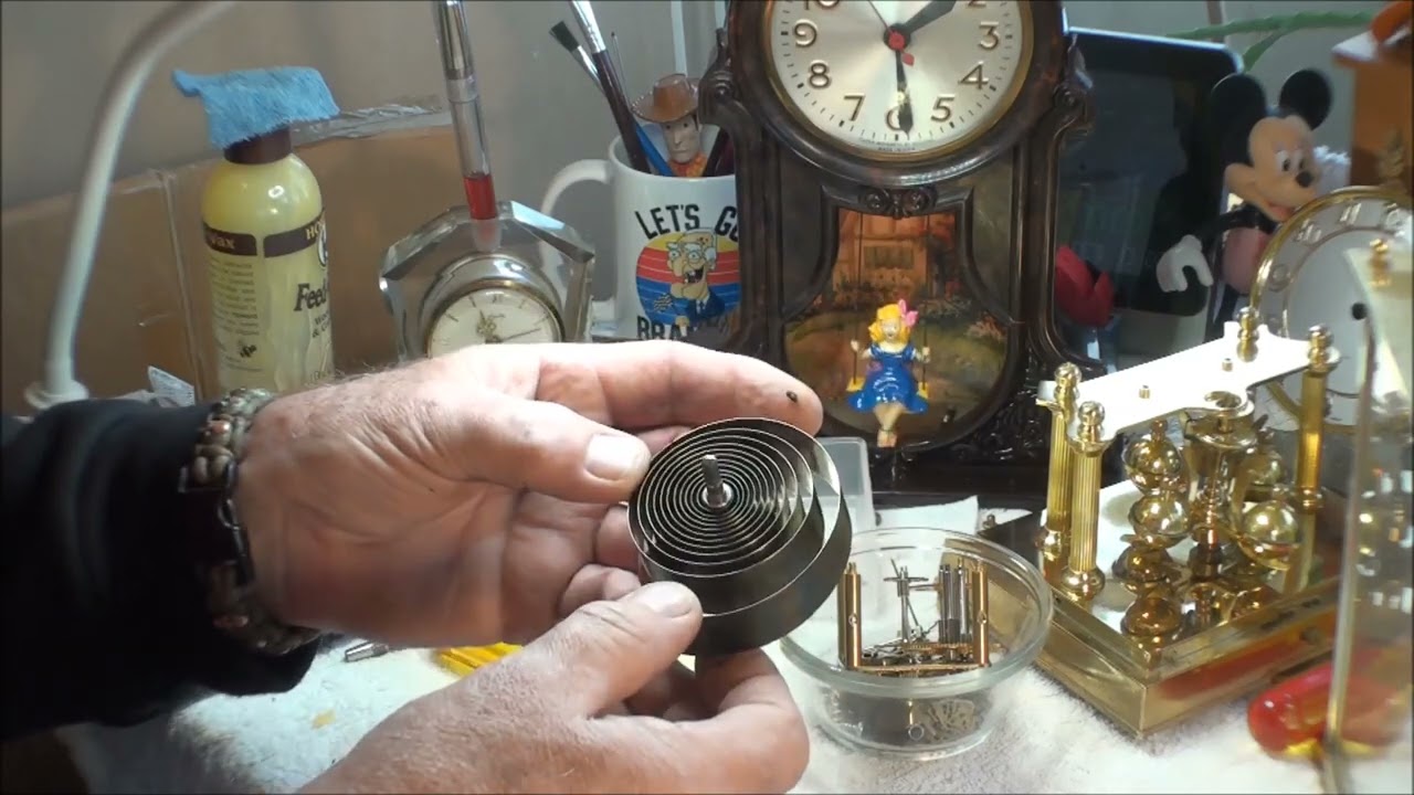 Taking apart the main spring barrel from a Masters Anniversary Clock ...