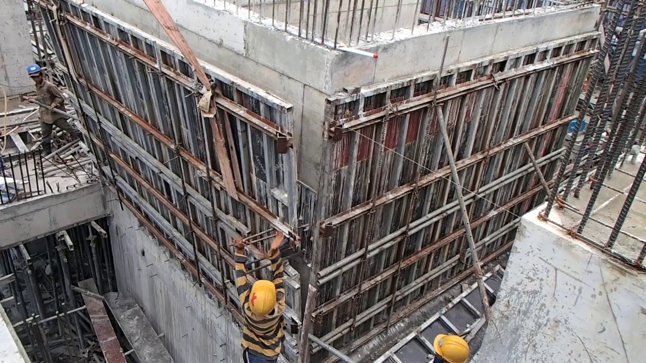 ការរើពុម្ពជញ្ជាំងជណ្តើរយន្ត (Remove formwork core wall) - YouTube